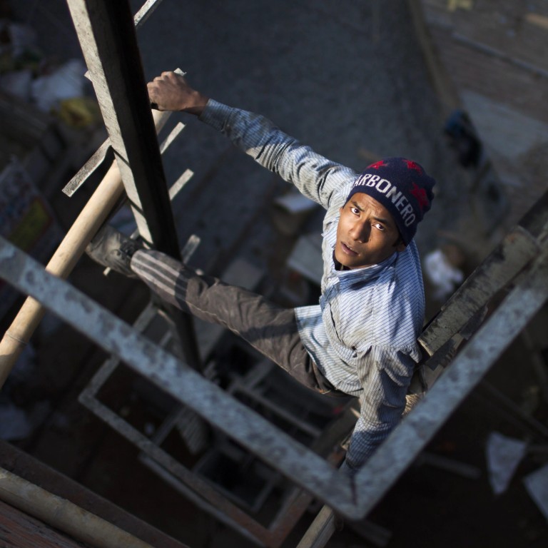 Nepalis apply to work overseas in record numbers despite risk of abuse ...