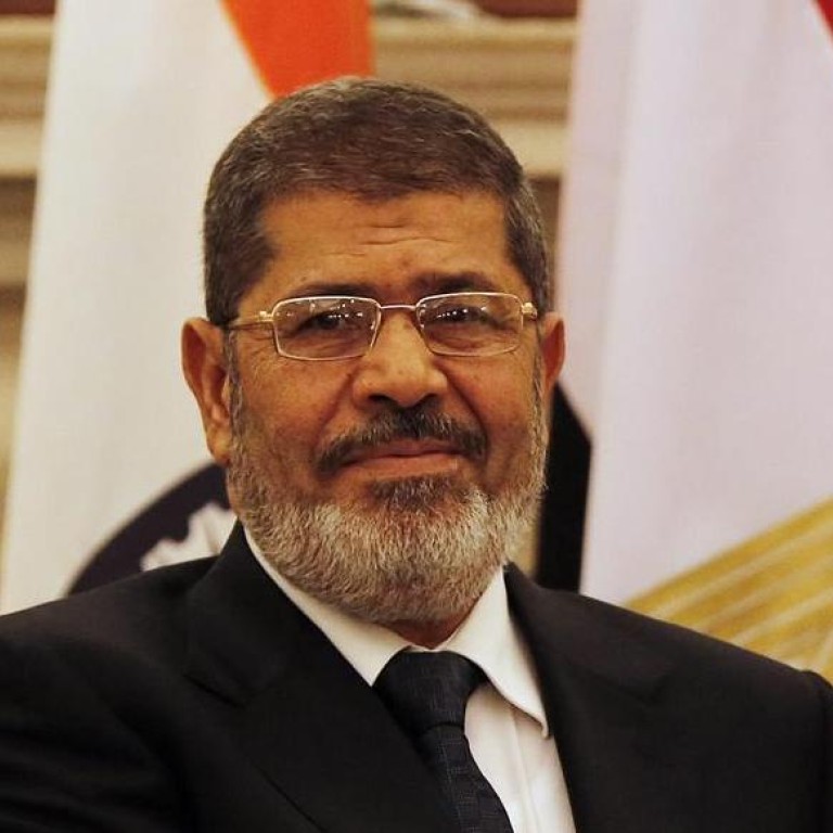 Mursi claims he is being muzzled in soundproof dock at trial | South ...