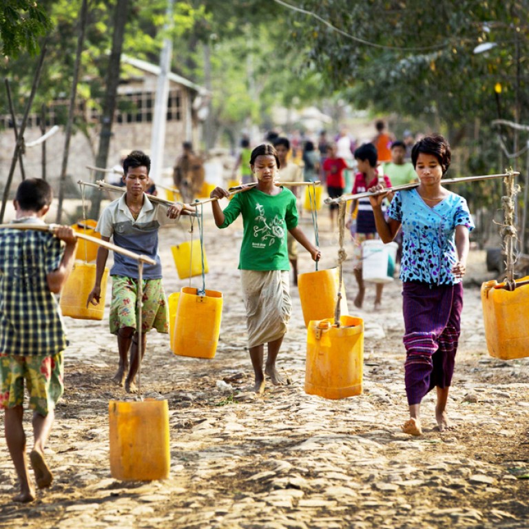 With pond the only water supply in village near Yangon, Myanmar's boom ...