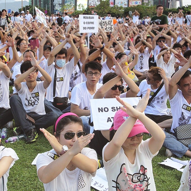 Macau protests force chief executive Fernando Chui to scrap ...