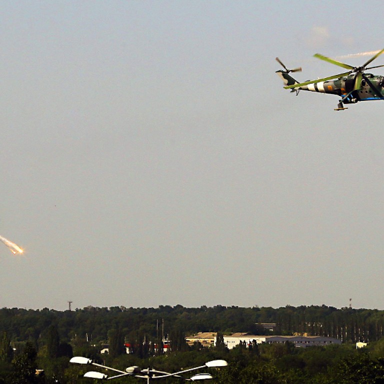 Rebels shoot down Ukrainian military helicopter, killing at least 12 ...
