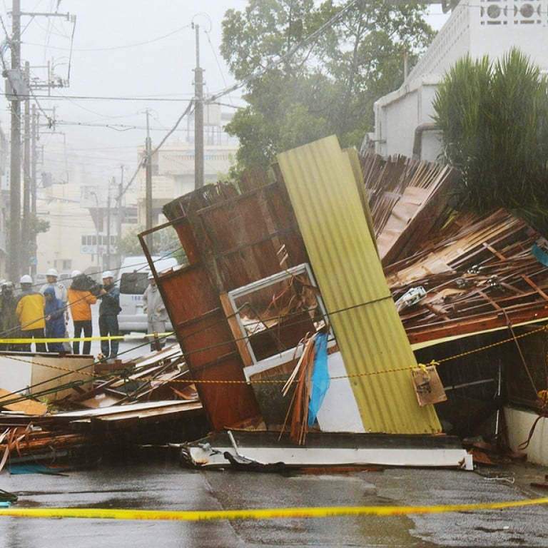 Weakened Typhoon Neoguri still packs torrential punch as it hits Japan ...