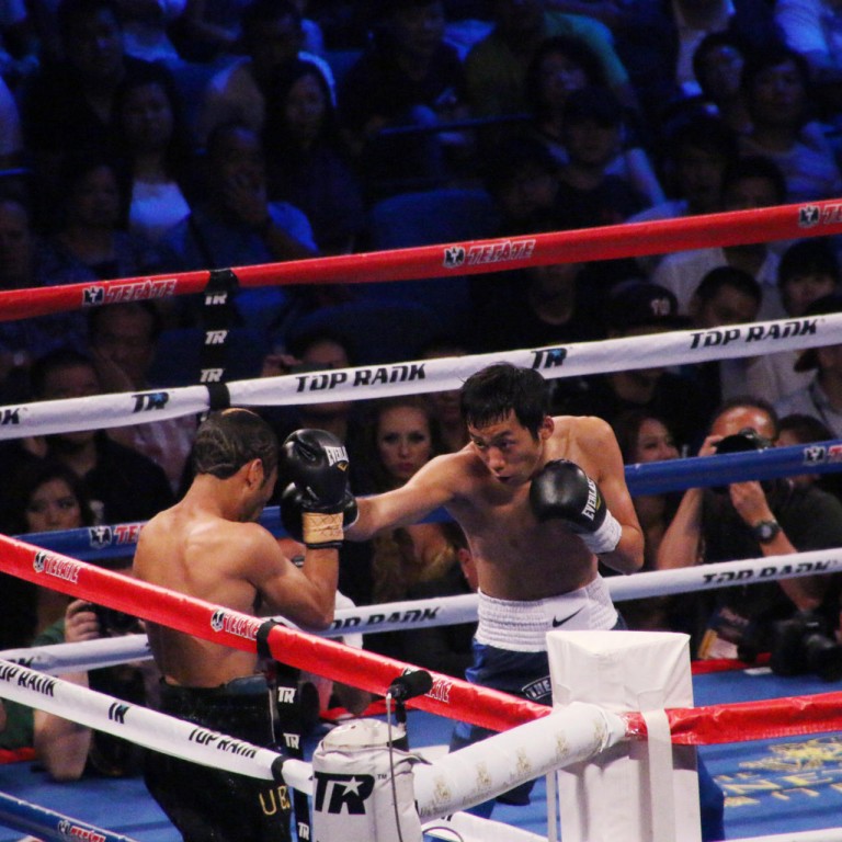 Hong Kong's 'Wonder Kid' Rex Tso pounds Indonesia's John Bajawa for ...
