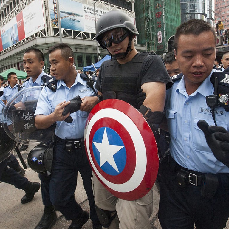 Police claim Occupy protesters wearing costumes are hiding from the law ...