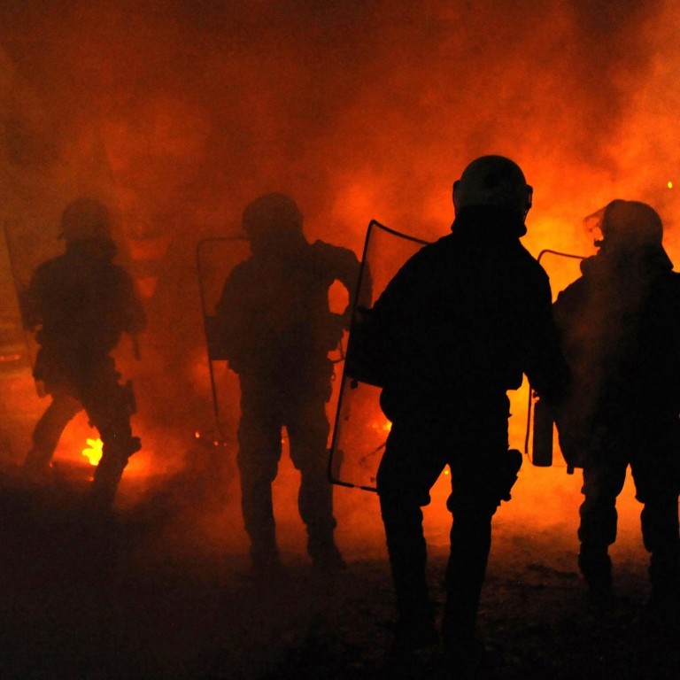 Protesters clash with police in Greece over shooting of unarmed ...