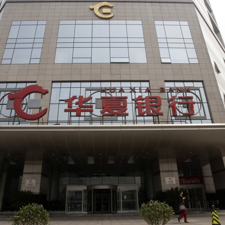 Chinese bank chief investigated by anti-corruption agency | South China ...