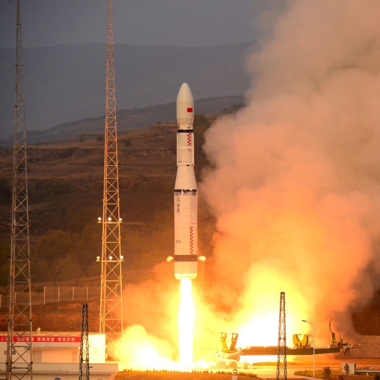 China launches new workhorse 'Long March' rocket with 20 'micro ...