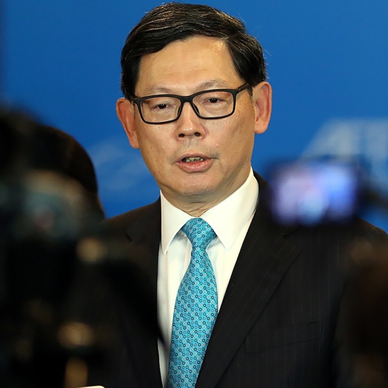 HKMA head Norman Chan vows to defend Hong Kong peg with HK$3.3tn war ...