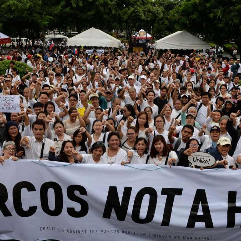 Hundreds protest ‘hero’s burial’ for Philippine dictator Marcos | South ...