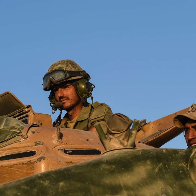 More Turkish tanks enter northern Syria to open new front | South China ...