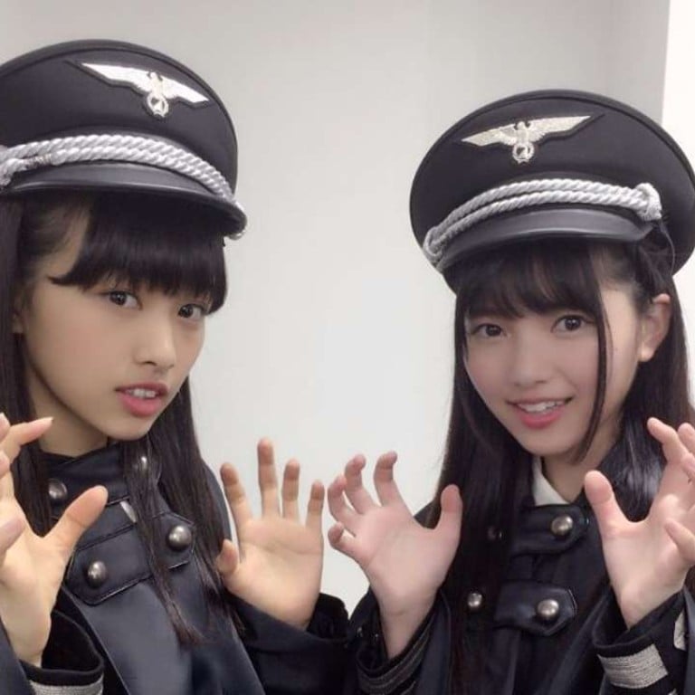 Japanese girl band sparks outrage after donning Nazi-style costumes for ...