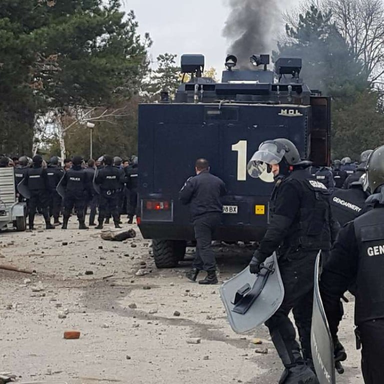 Bulgarian police fire rubber bullets to quell riot in refugee camp ...