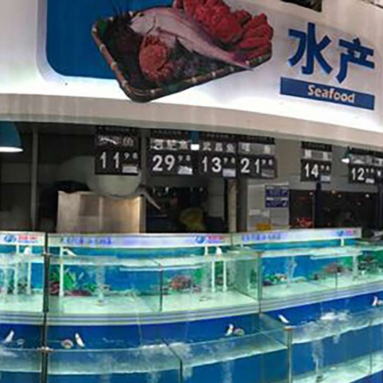 Live fish out of water in Beijing supermarkets as tanks emptied ahead ...