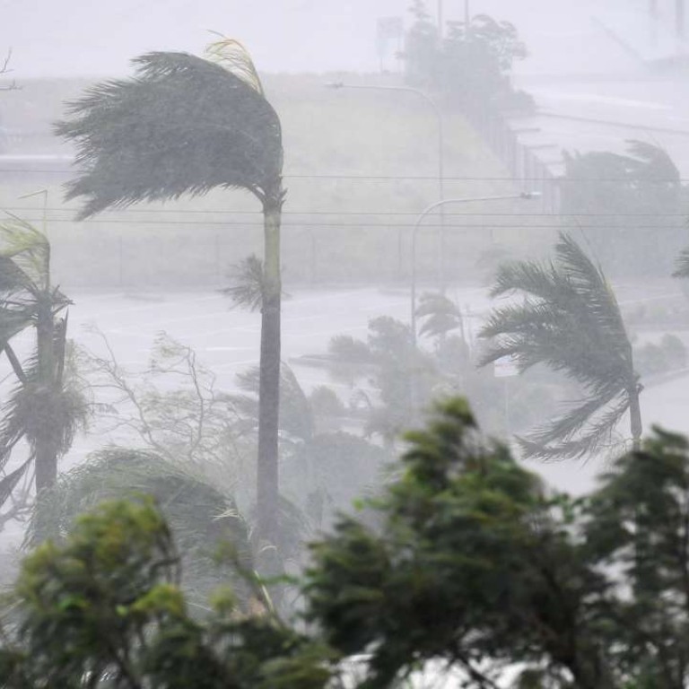 Thousands flee as super cyclone Debbie crosses Australian coast, with ...