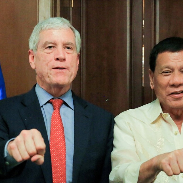 Australia defends spy chief after ‘fist bump’ photo op with Philippine ...
