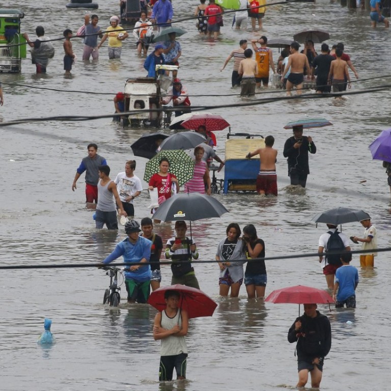 Flooding, landslides kill four in Philippines as tropical depression ...