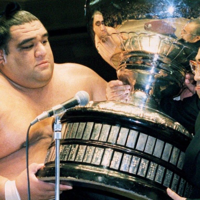 Screaming young female fans show ancient sport of sumo can still fight ...