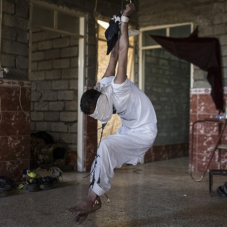 Photographer Ali Arkady captured images of evil as Iraqi torturers went ...