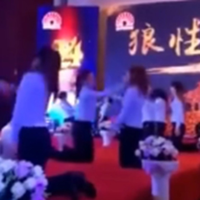 Chinese staff made to slap each other on stage at company’s anniversary ...
