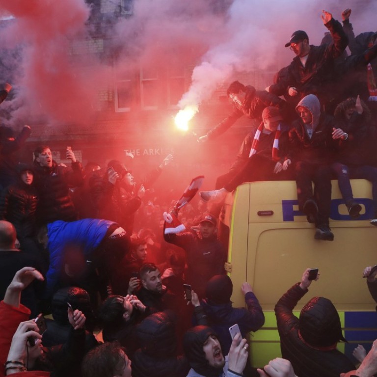 Liverpool fan in hospital as police arrest man for ‘serious assault ...