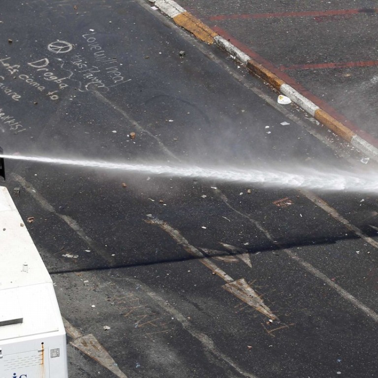 Hong Kong police expect first anti-riot vehicle with water cannons to ...