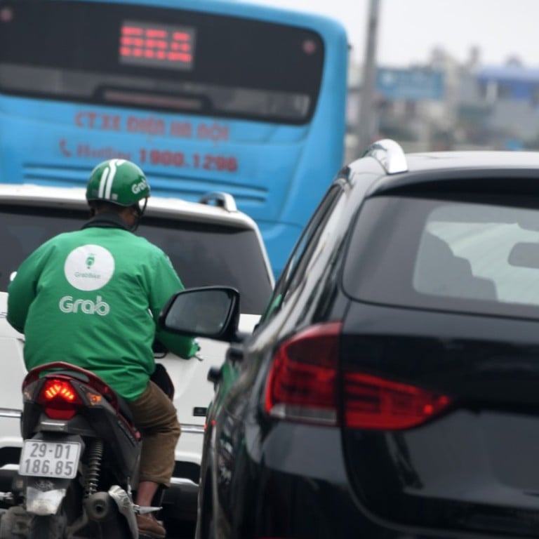 Southeast Asia ride-hailing app Grab expands into services in quest to ...