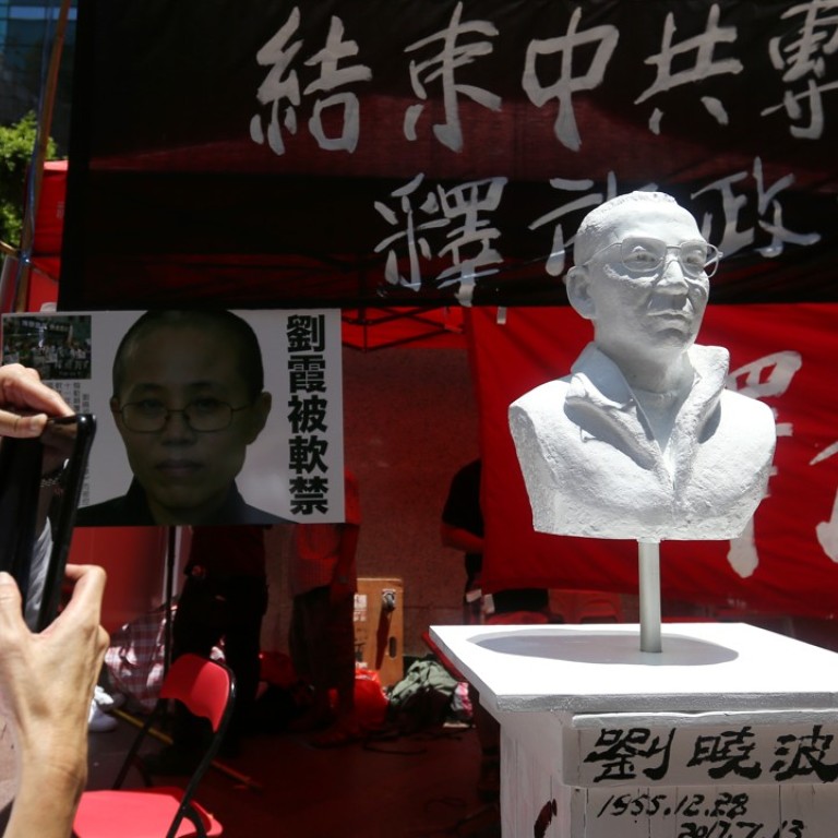 Bust of Chinese dissident Liu Xiaobo erected outside Hong Kong’s Times ...
