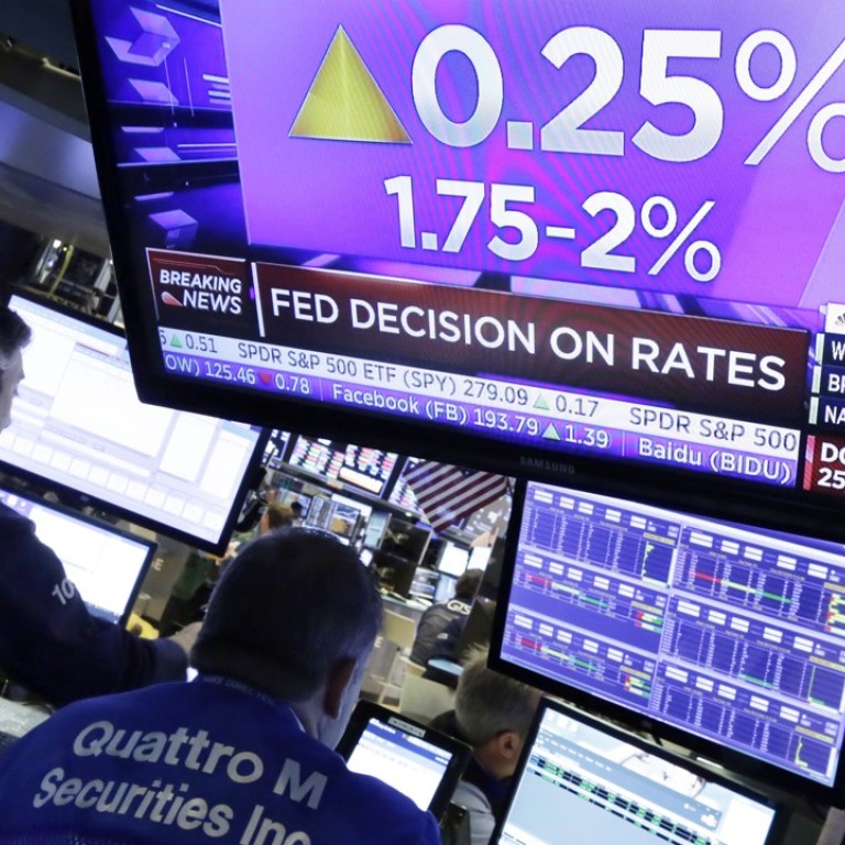 US Federal Reserve raises benchmark interest rate, sees possible ...