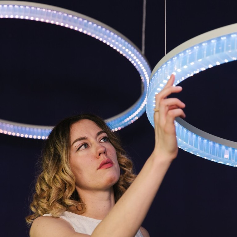 Designer turns window frame, table into mobile phone chargers and ...