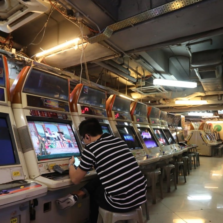 Masked gang smashes up Hong Kong video arcade in night attack | South ...