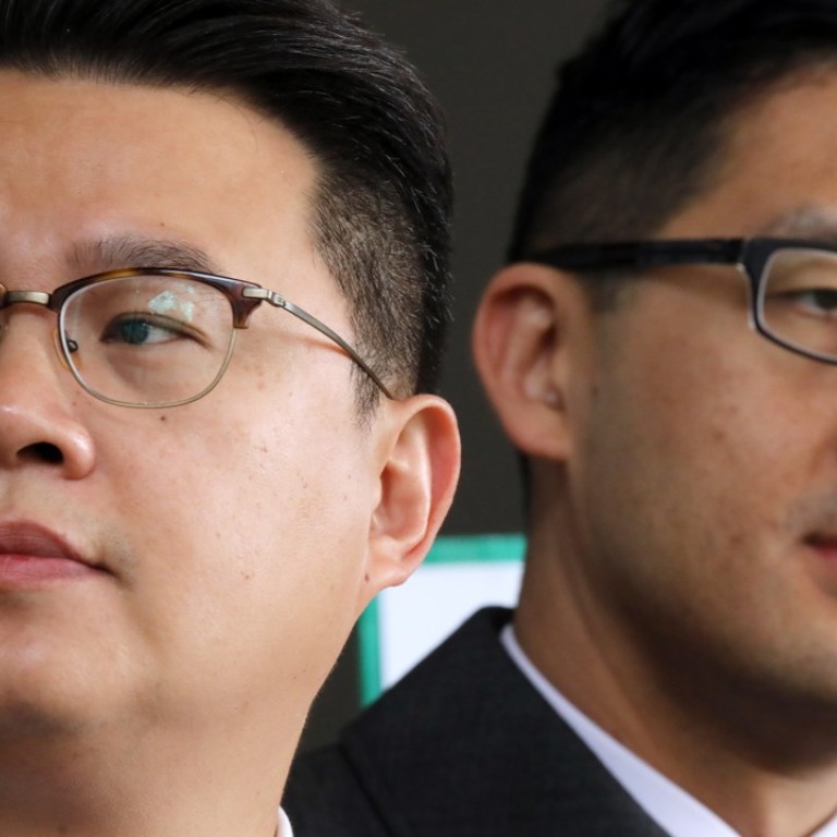 Hong Kong Democratic Party lawmakers Lam Cheuk-ting and Andrew Wan ...