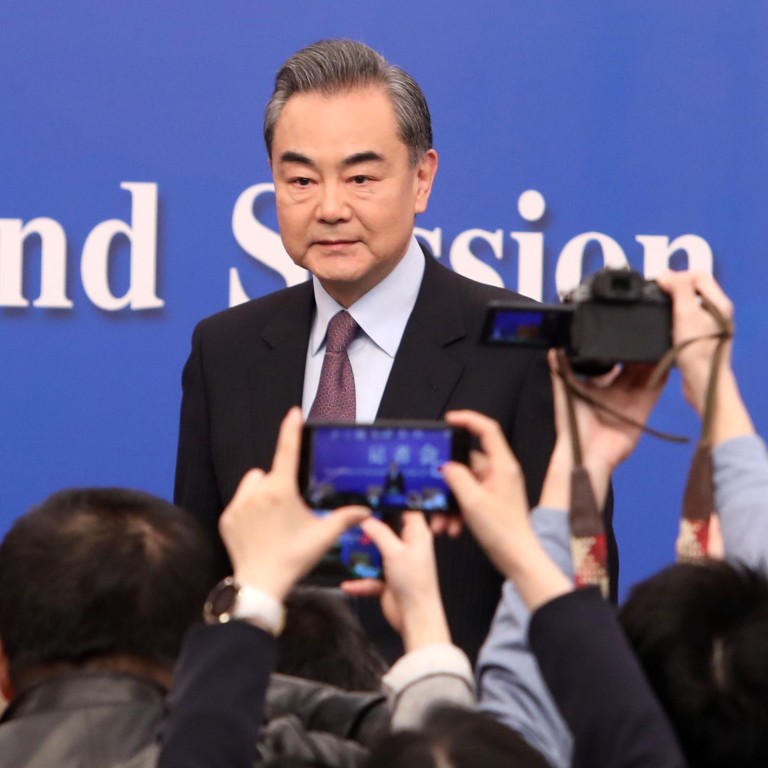China’s Foreign Minister Wang Yi calls for cooperation amid growing ...