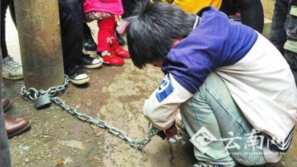 ‘Exasperated’ Chinese mum chains son, 13, to street pole for ...