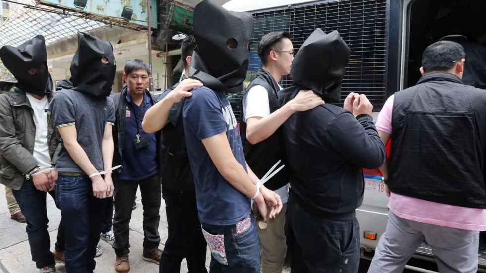 Hong Kong police raids strike triad gang with monopoly on lunch-box ...