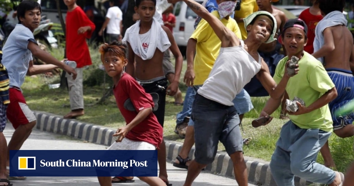 Police battle protesters in Manila slum riot | South China Morning Post