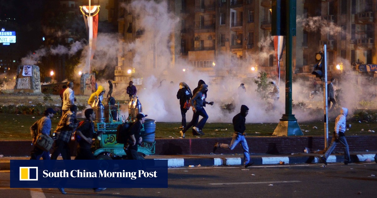 One killed as riot police storm Tahrir Square anniversary protest ...
