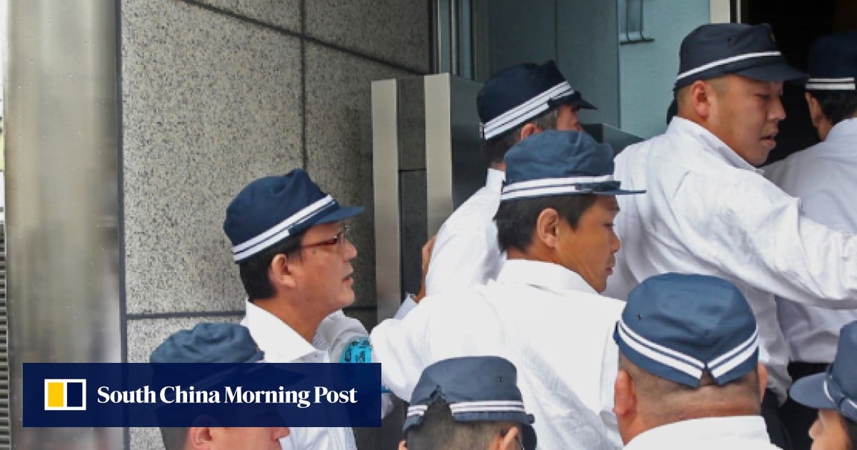 Japanese police raid yakuza offices as split raises fears of gang ...