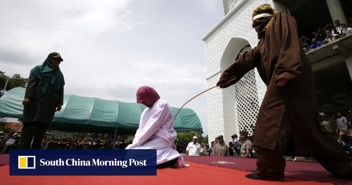 2 suspected Indonesian lesbians spared 100 cane lashes but will undergo ...