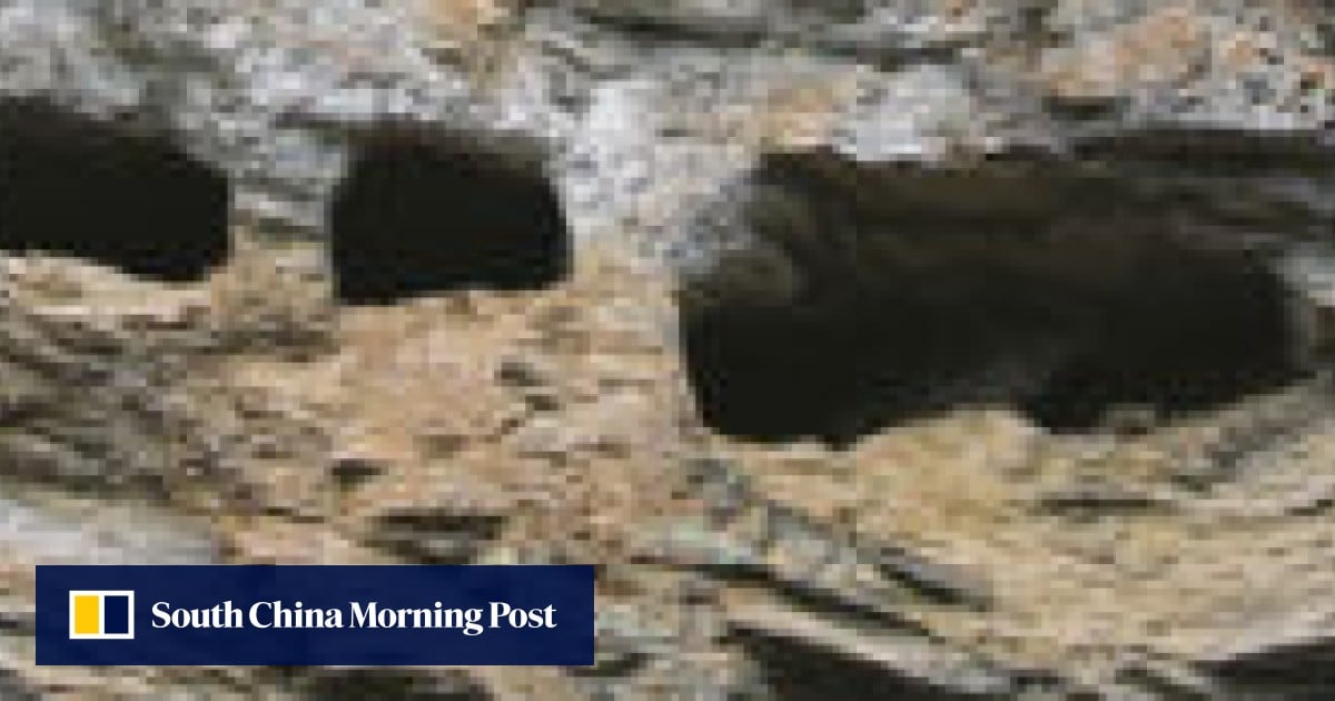 131 ancient Chinese ‘hanging’ coffins found on side of 100m cliff near ...