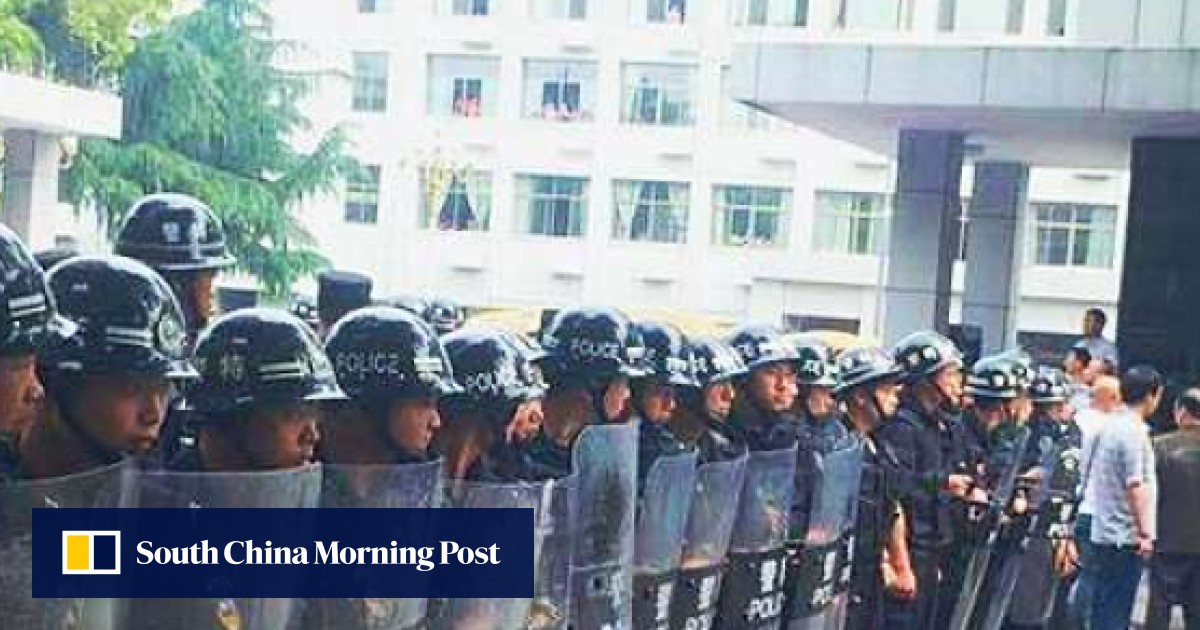 Riot police deployed as teachers in central China stage protest over ...