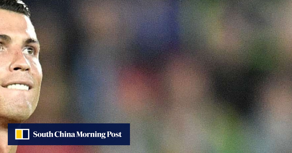 WATCH: Cristiano Ronaldo chucks reporter’s microphone into a lake at ...