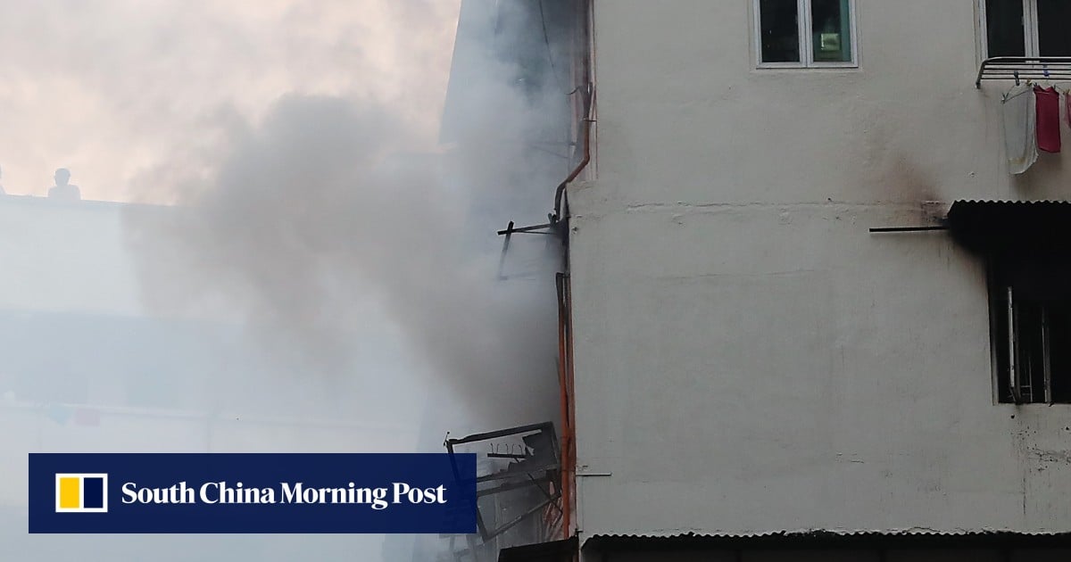 Fire hits Hong Kong residential block, injuring two as 130 others ...