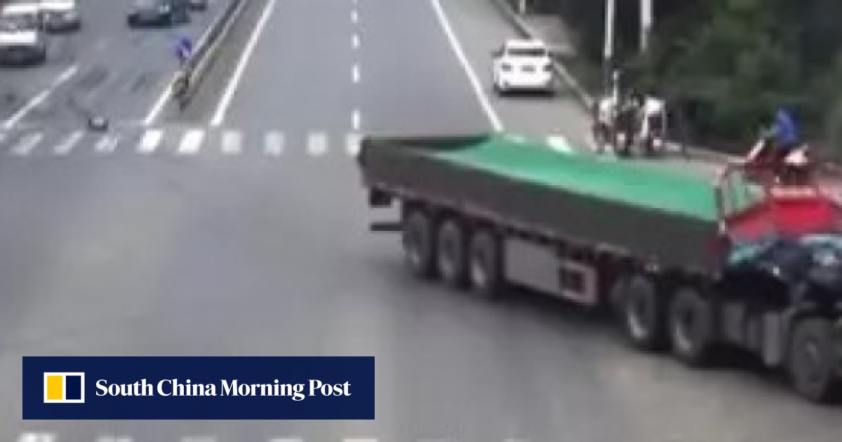 Truck driver unhurt after cab flips over while he changes lanes | South ...