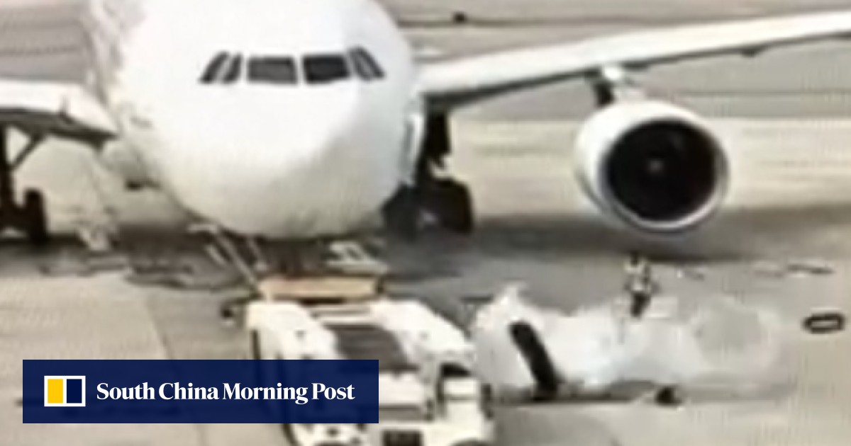 Dramatic footage emerges of tyre explosion on aircraft tug at Hong Kong ...